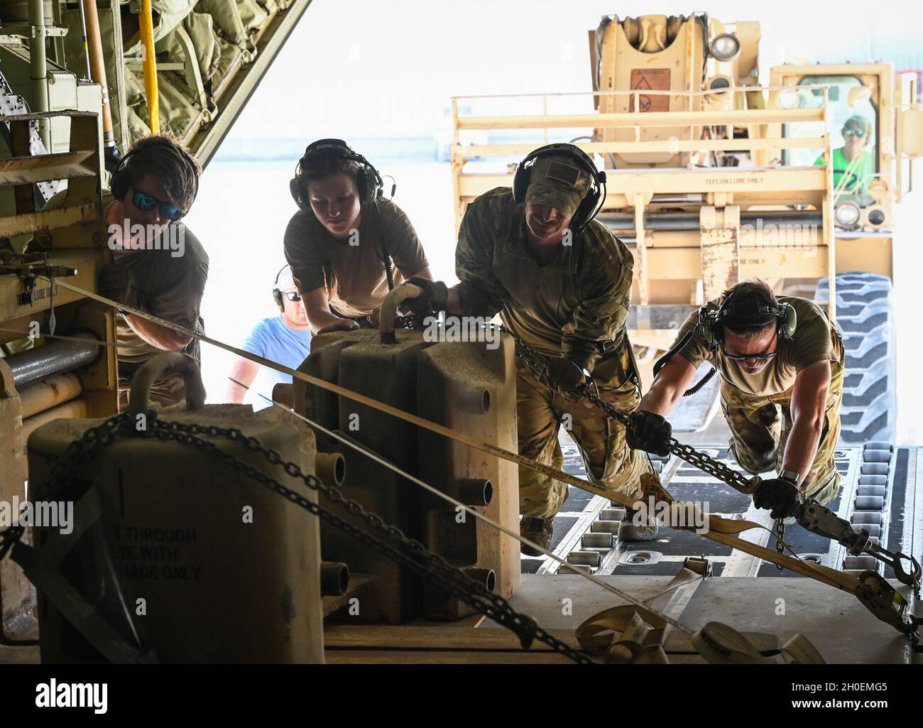 U.S. Airmen assigned to the 75th Expeditionary Airlift Squadron (EAS ...