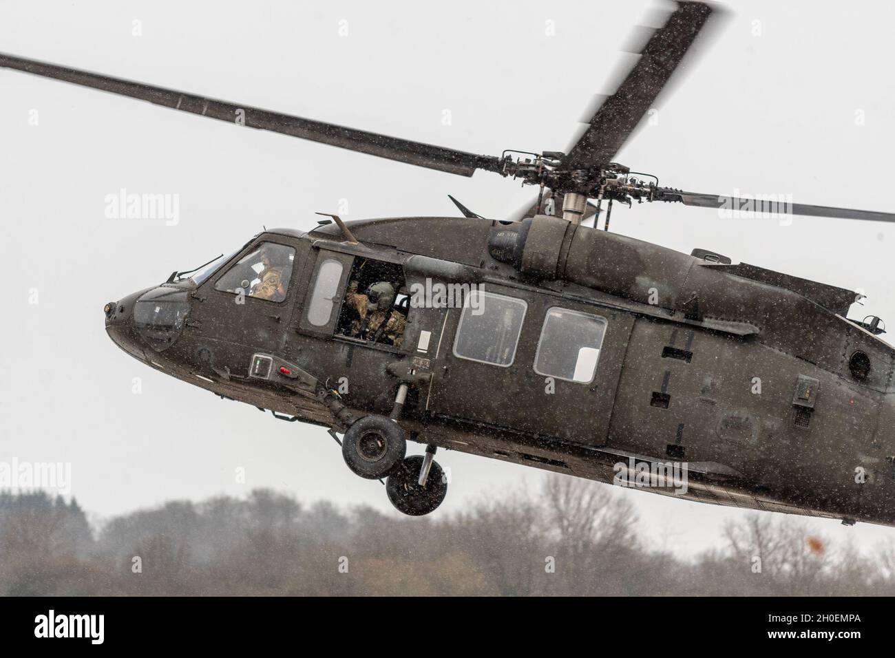 U.S. Army UH-60 Blackhawk helicopters from the 12th Combat Aviation ...