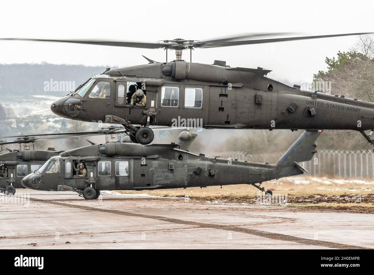 U.S. Army UH-60 Blackhawk helicopters from the 12th Combat Aviation ...