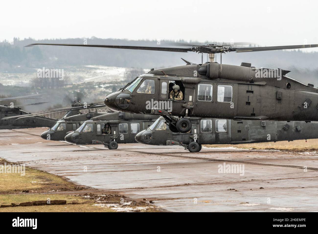 U.S. Army UH-60 Blackhawk helicopters from the 12th Combat Aviation ...