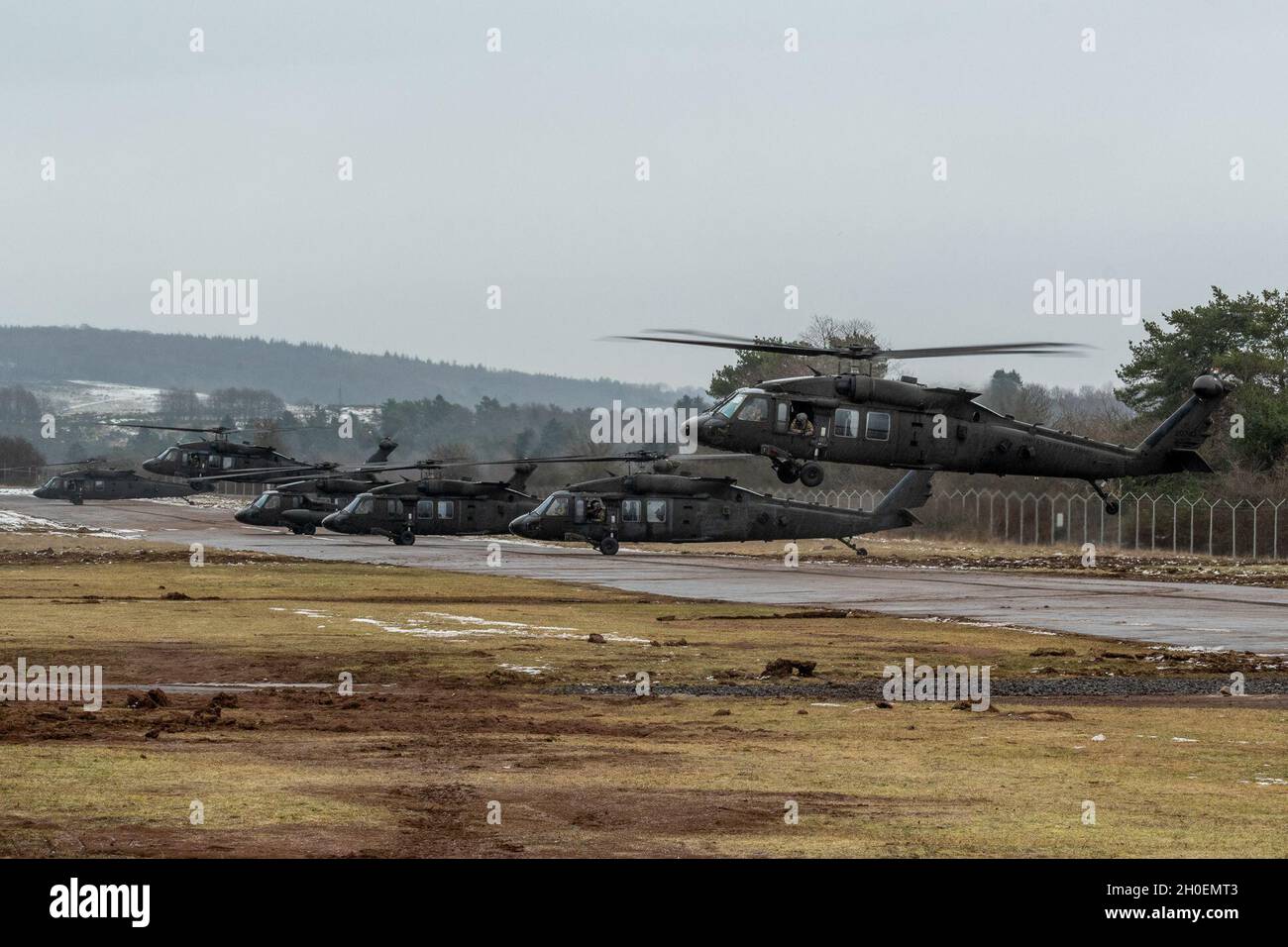 U.S. Army UH-60 Blackhawk helicopters from the 12th Combat Aviation ...