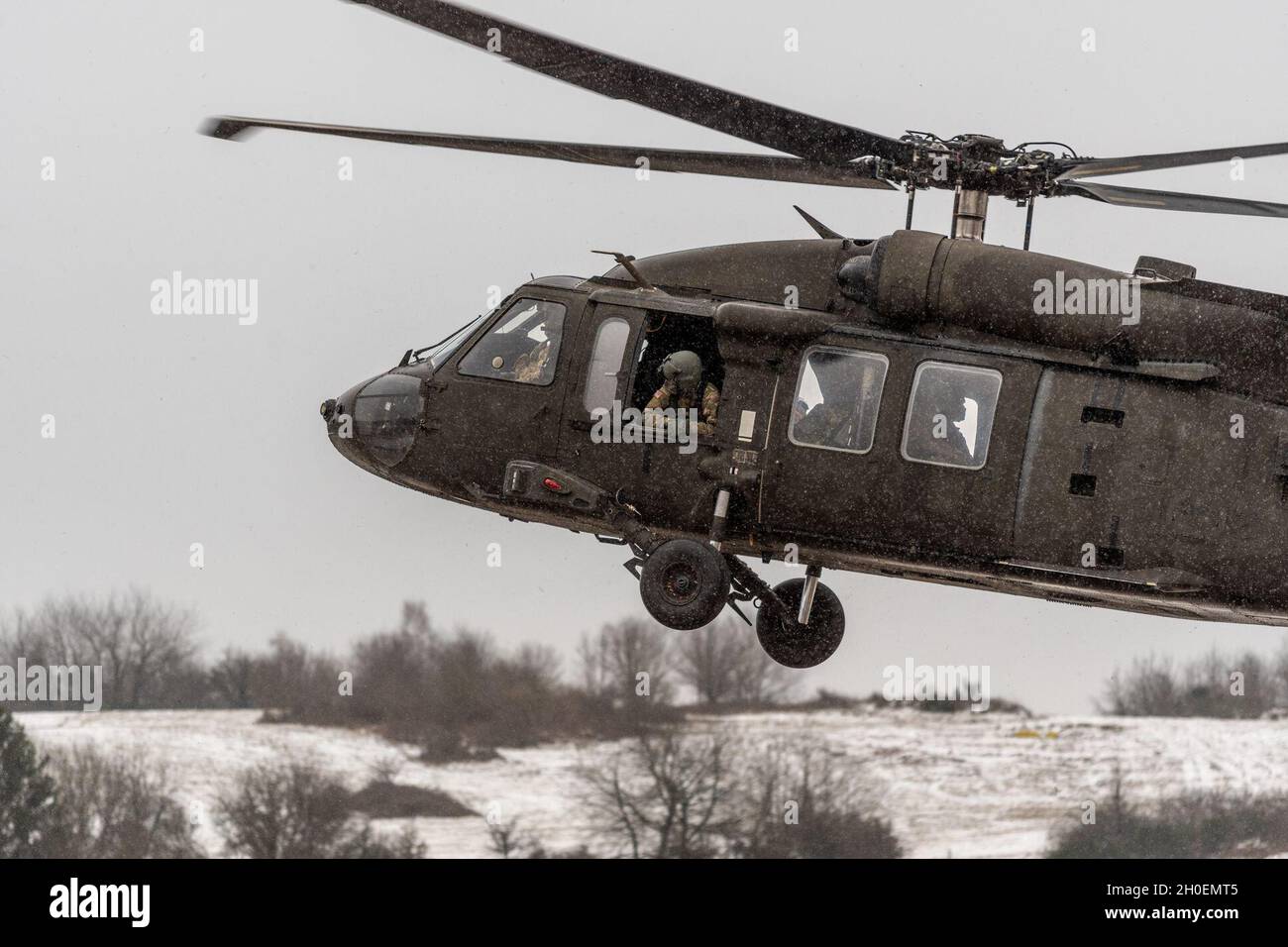 U.S. Army UH-60 Blackhawk helicopters from the 12th Combat Aviation ...