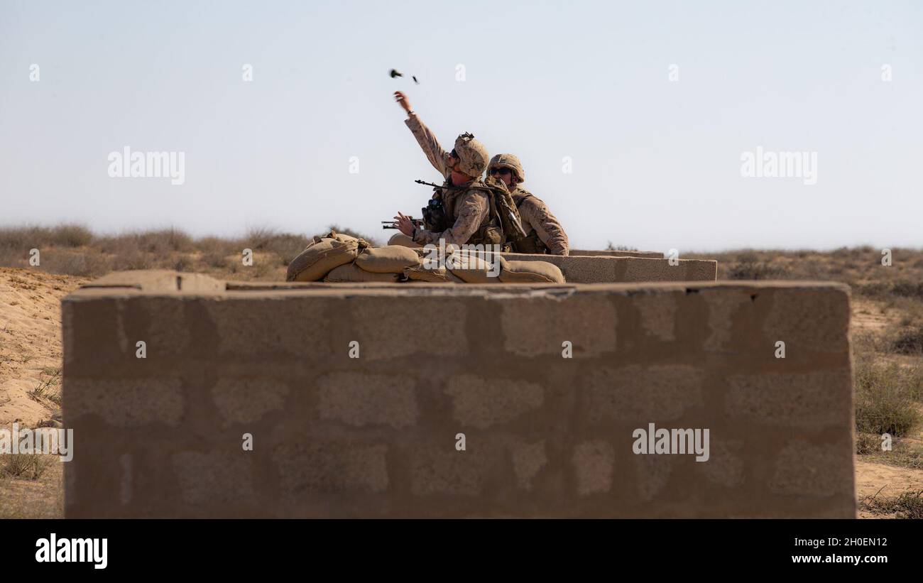 U.S. Marine Corps Lance Cpl. Michael Mikler, a designated marksman with ...