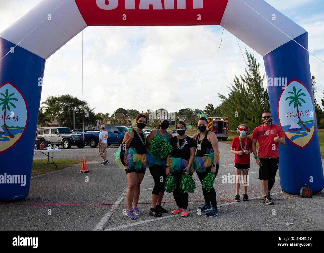 Participants pose for a picture before starting the first ever Fat ...