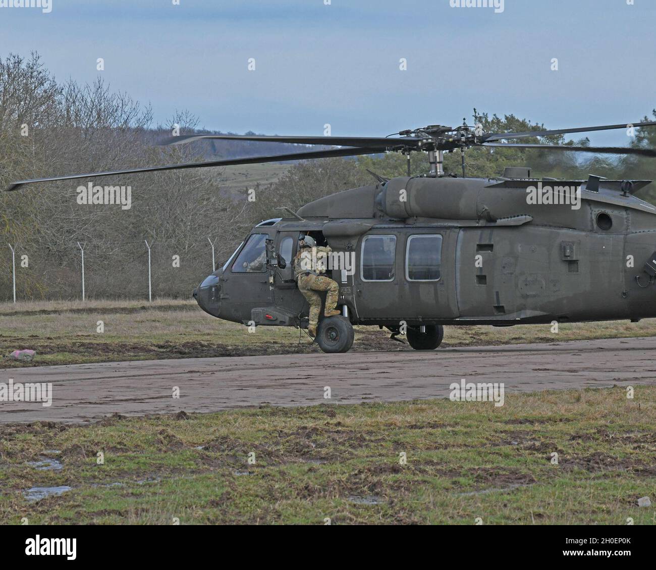 The Gunner of an UH-60 Blackhawk helicopter with 12th Combat Aviation ...