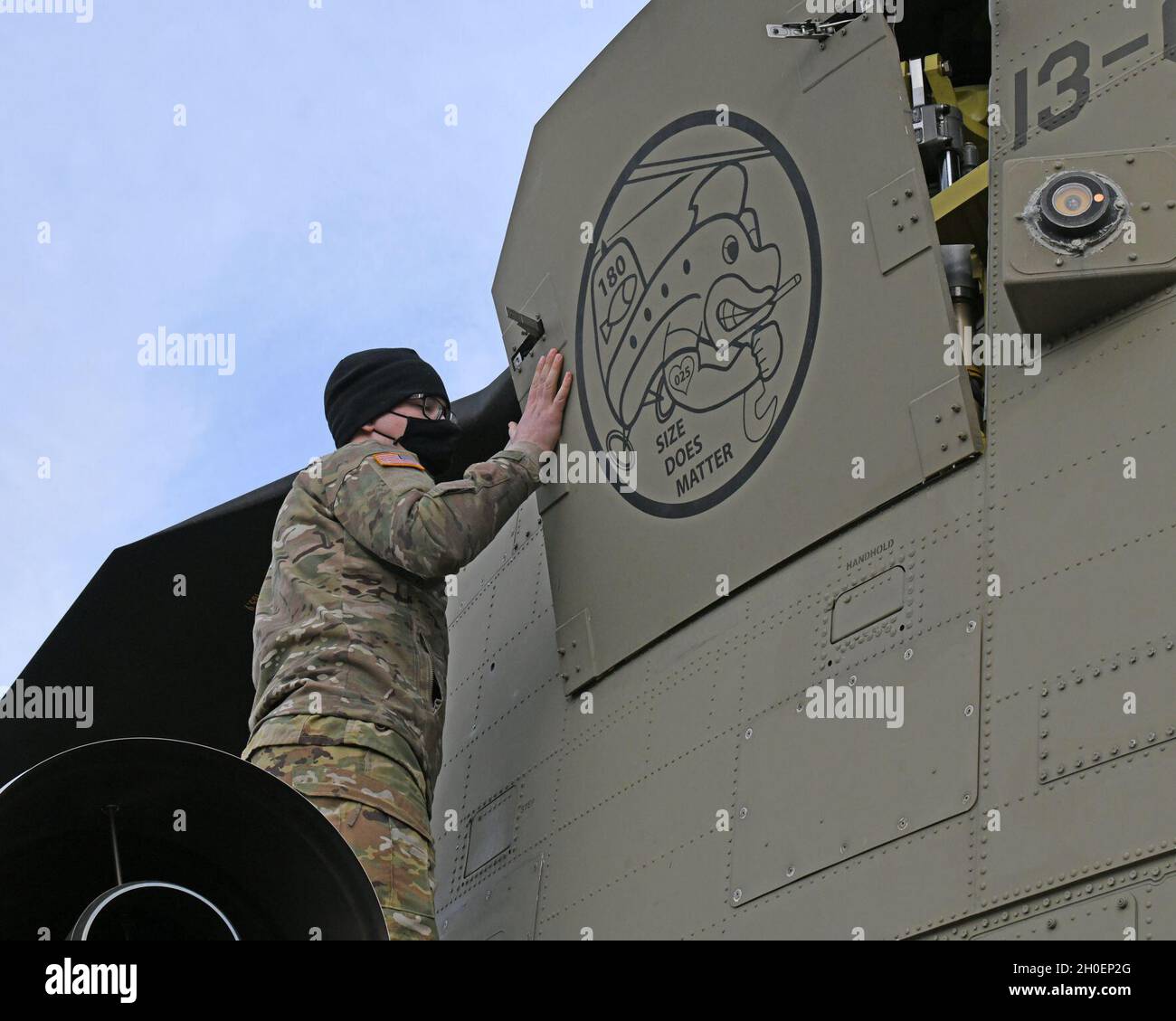 A U.S. Army soldier with 12th Combat Aviation Brigade (12th CAB), opens ...