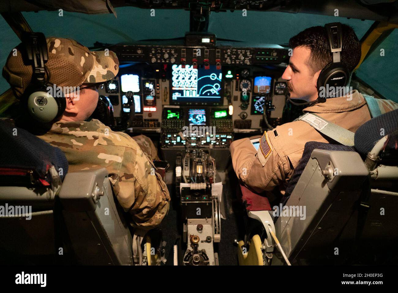 Two U.S. Air Force KC-135 Stratotanker crew members perform pre-flight ...