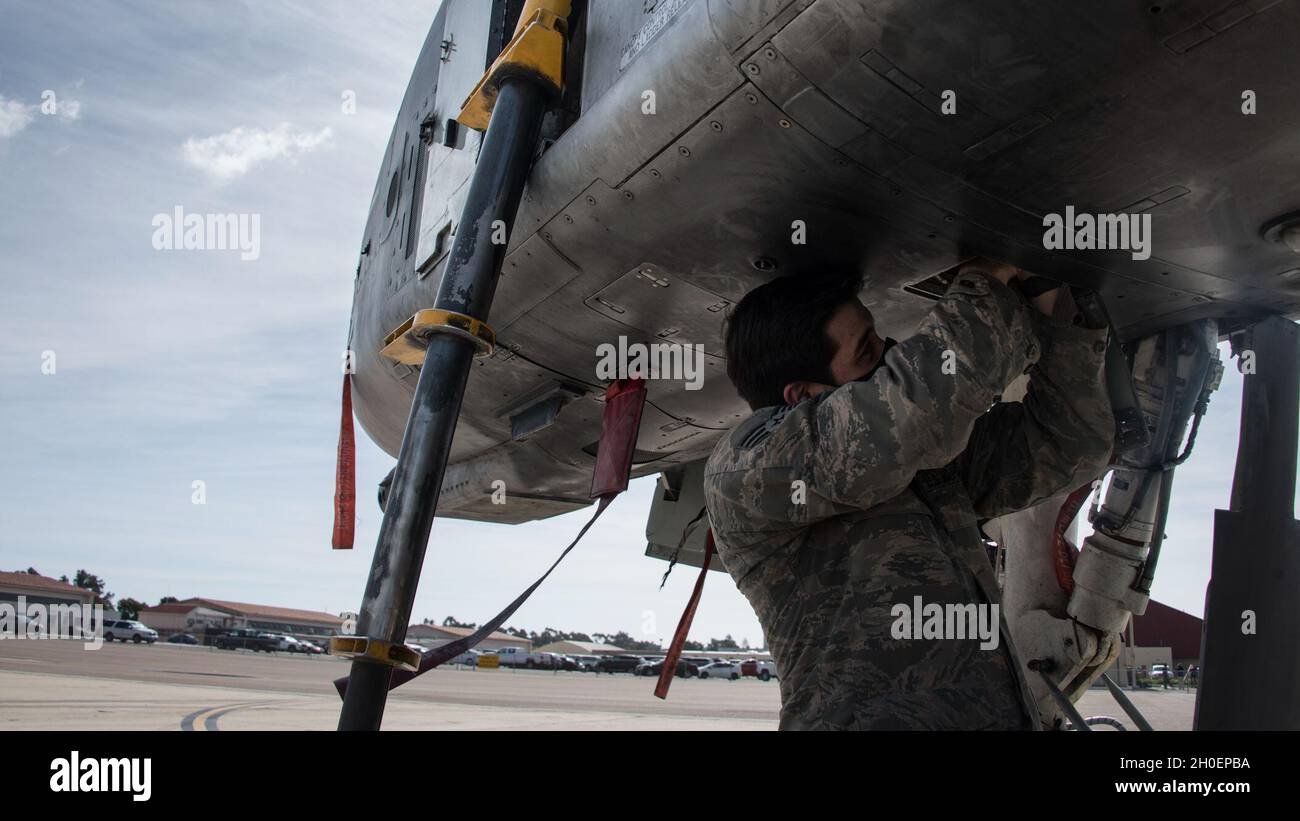 A U.S. Airman from the 354th Aircraft Maintenance Unit performs ...