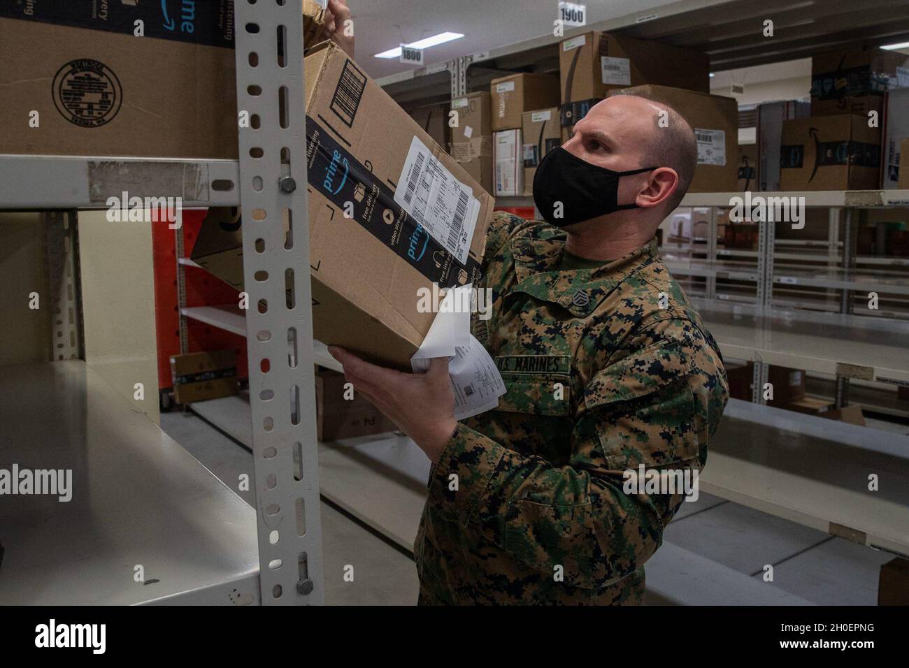 U.S. Marine Corps Staff Sgt. Eric Charpentier, a custodian of postal ...