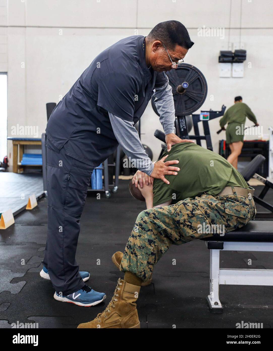 Scott Williams, an athletic trainer certified with the Smart Clinic ...