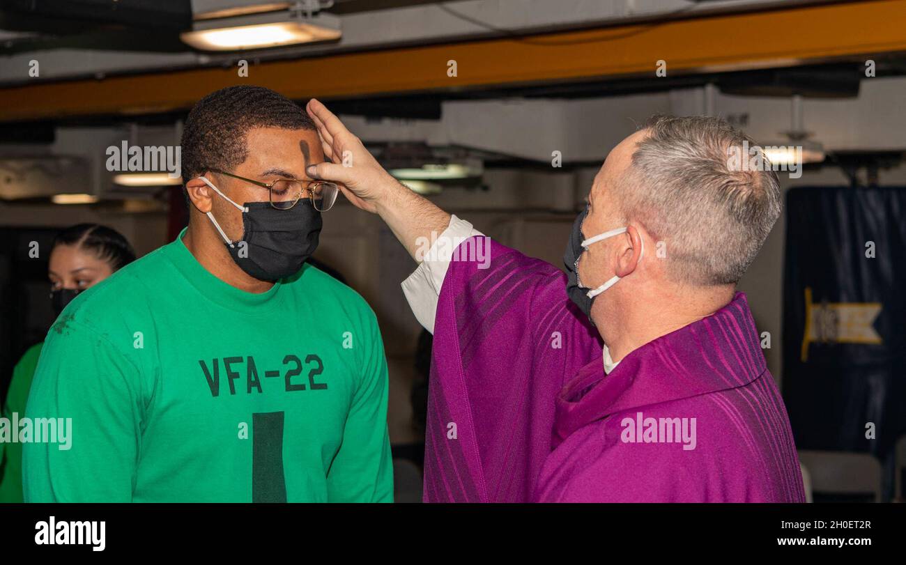 210217-N-JX182-1003 PACIFIC OCEAN (Feb. 17, 2021) Lt. Matthew Benjamin ...