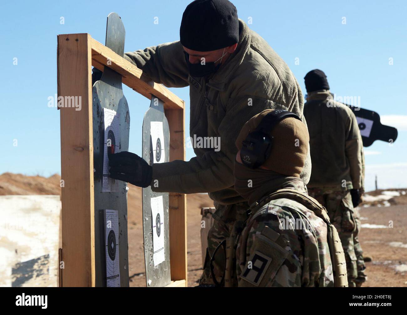 An observer, coach/ trainer assigned to Task Force Mountain Warrior ...