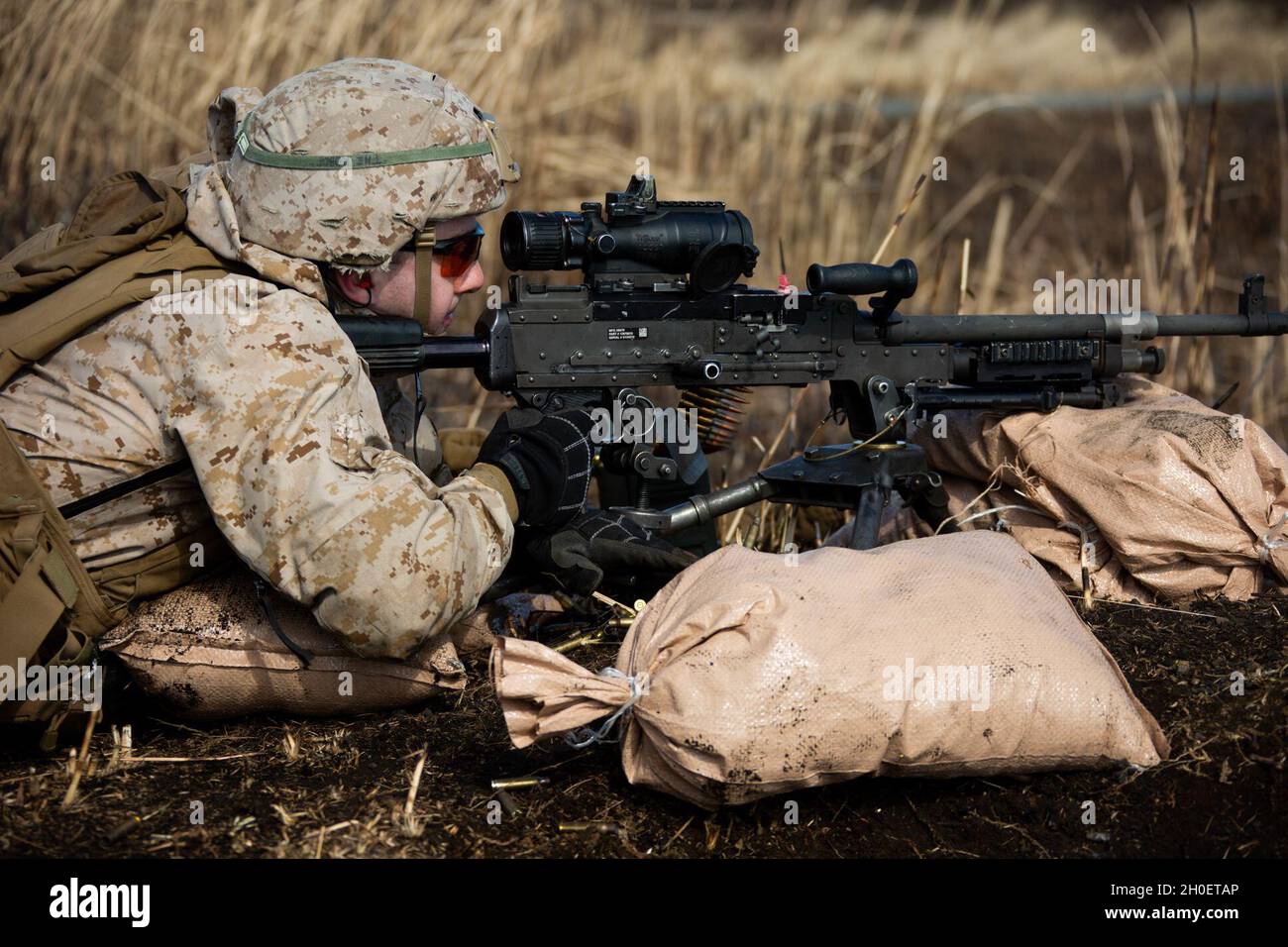 U.S. Marine Corps Lance Cpl. Andrew Swanson, a machine gunner with 3d ...