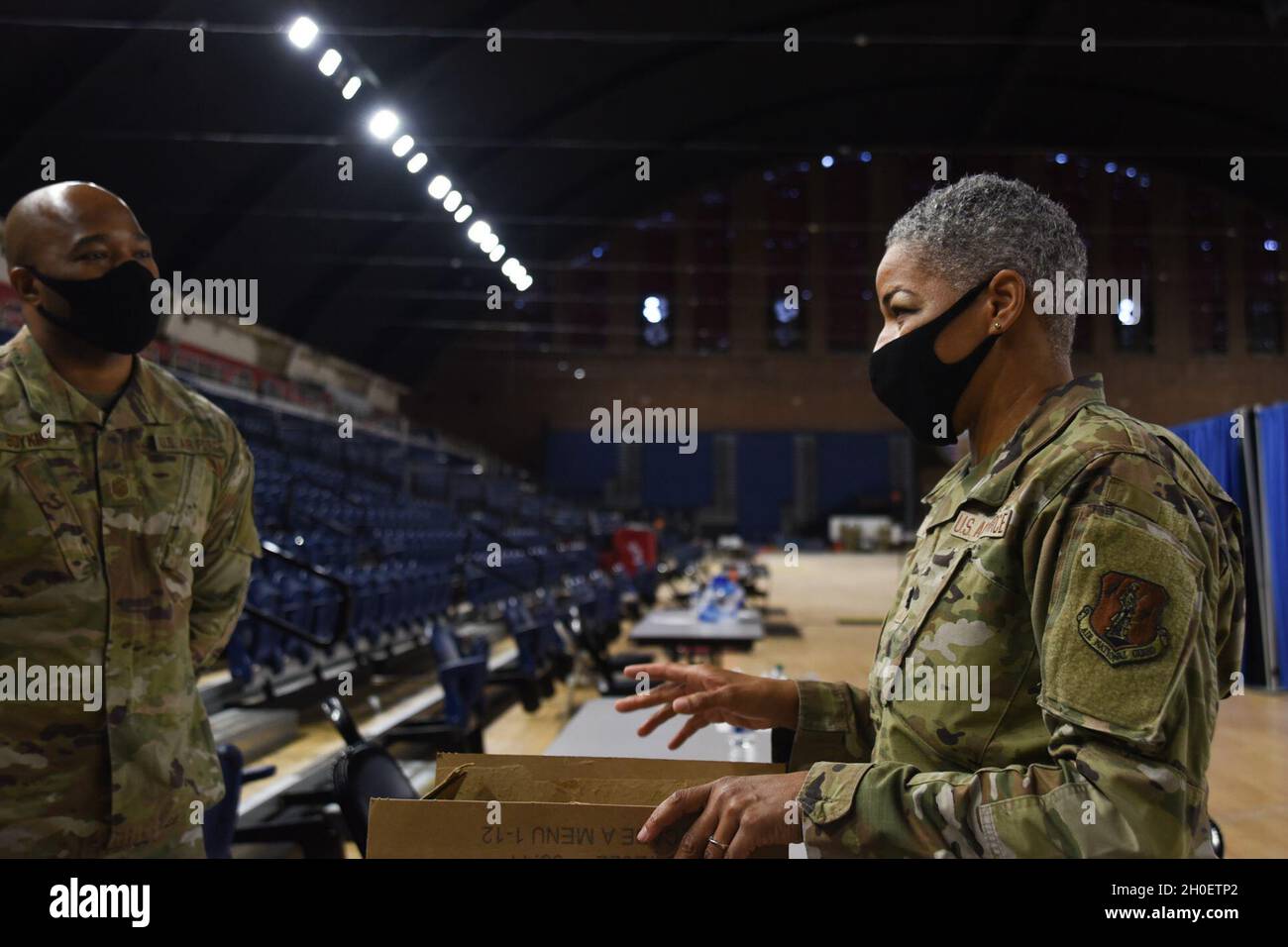 U.S. Air Force Lt. Col. Countess Cooper, center, a chaplain with the ...
