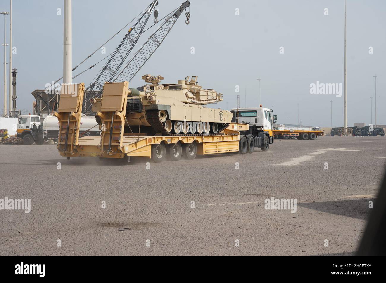 A M1A1 Abrams tank is transported to a staging yard after being ...