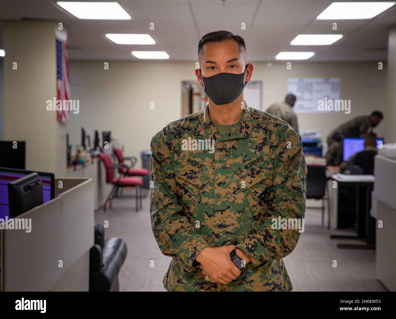 U.S. Marine Corps Chief Warrant Officer 3 Sambo Phoeuk, the temporary ...