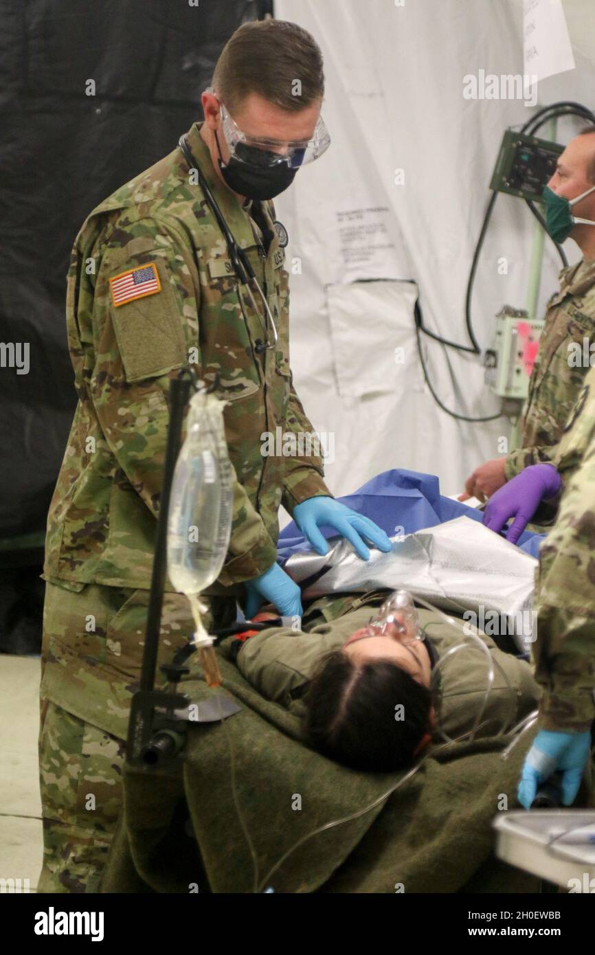 Sergeant Blake Small, a medic with the 811th Hospital Center, 139th ...