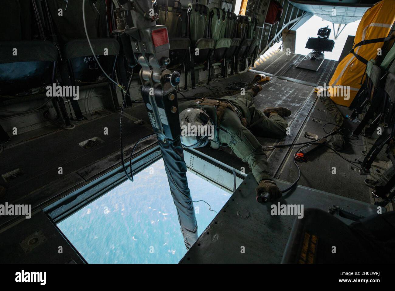 A U.S. Marine Corps crew chief with Marine Heavy Helicopter Squadron ...