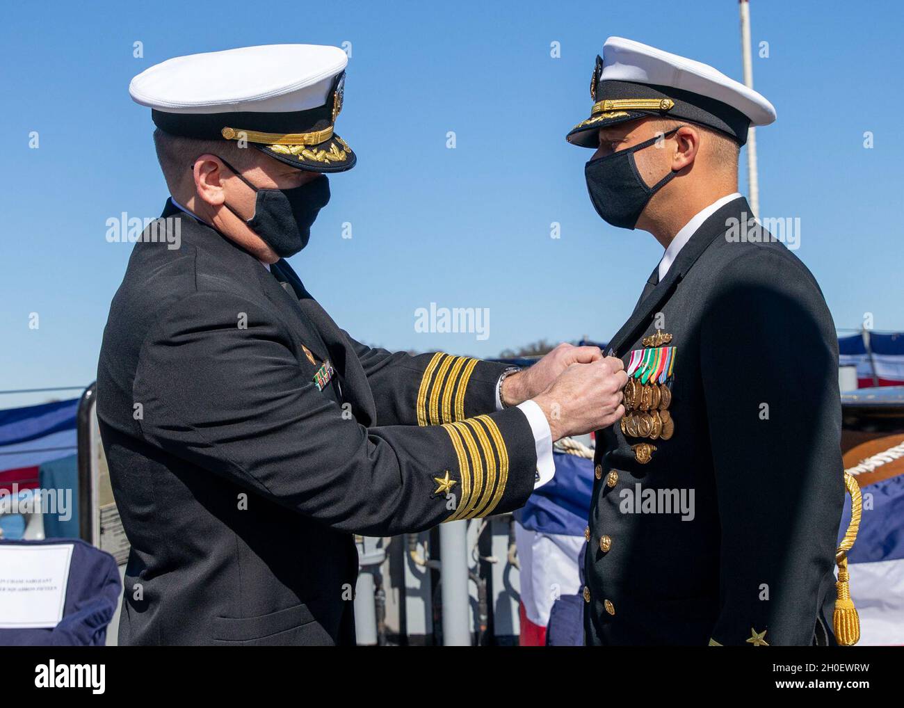 Capt. Chase Sargeant, left, commander, Destroyer Squadron (DESRON) 15 ...