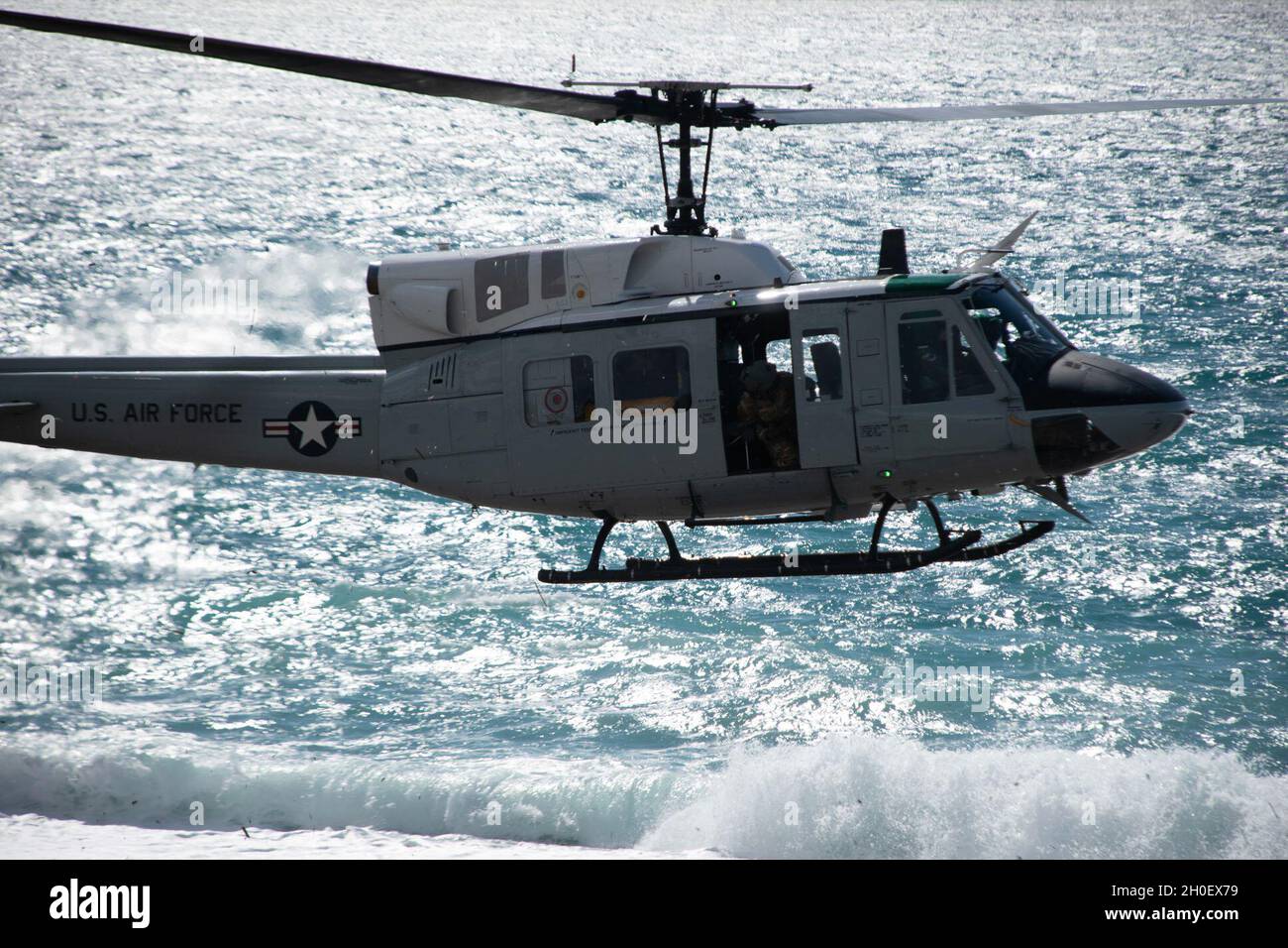 A UH-1N helicopter, assigned to the 459th Airlift Squadron, touches ...