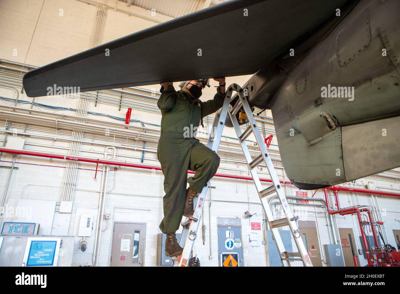 Corporal Miguel Colon-Morales, a fixed-wing airframe mechanic, inspects ...
