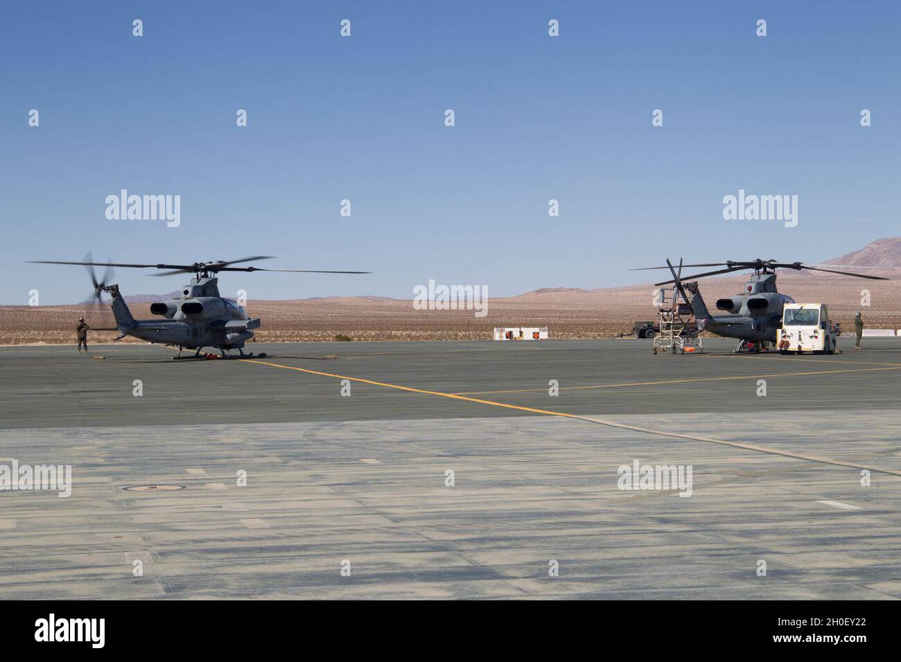 Two Bell UH-1Y Venom helicopters with Marine Light Attack Helicopter ...