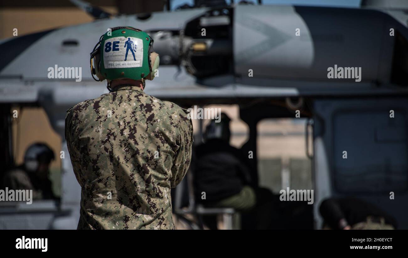A U.S. Navy Sailor from Helicopter Sea Combat Squadron 85 performs pre ...
