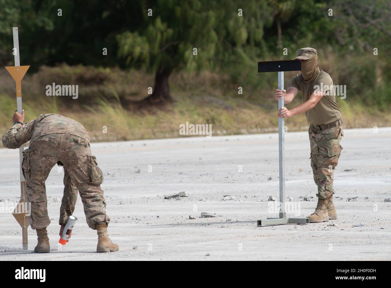 Airmen with the 554th RED HORSE Squadron prep an Airfield for repair ...