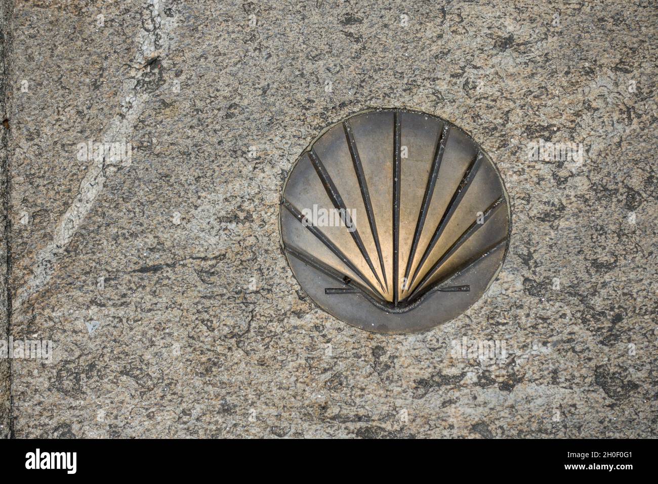 St. James's shell, a symbol of the route, on a wall Stock Photo - Alamy