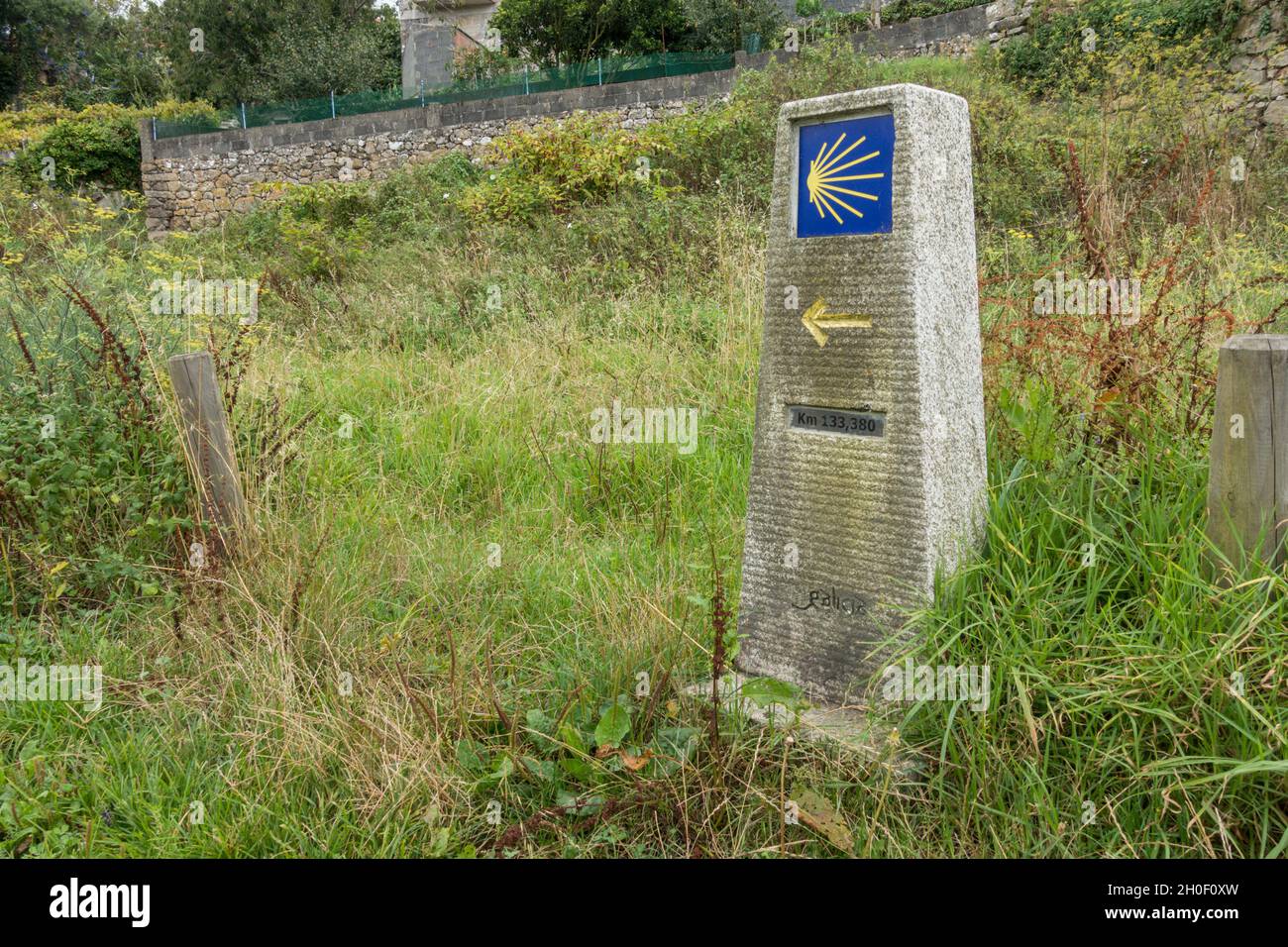 Stone pillar sign Way of St James, direction Camino de Santiago ...