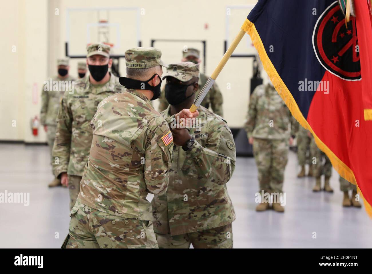 Command Sgt. Maj. Anthony McLean passes the colors of the 27th Infantry ...