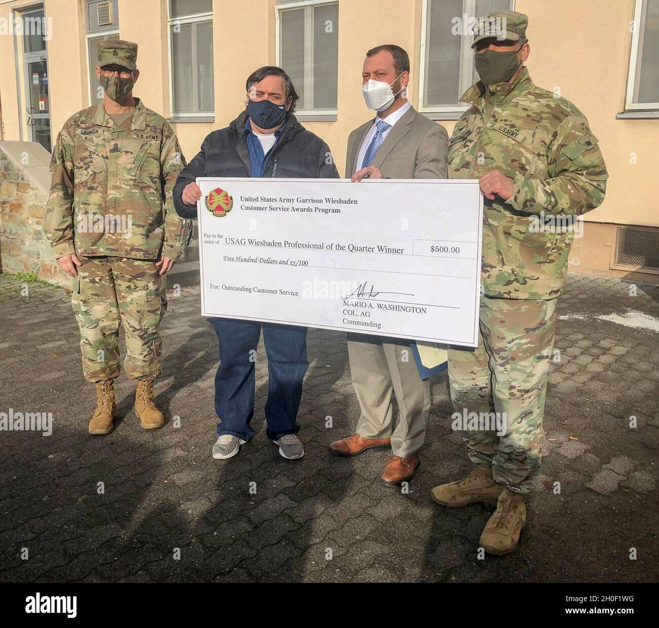 Garrison Commander Col. Mario Washington, accompanied by Command Sgt ...
