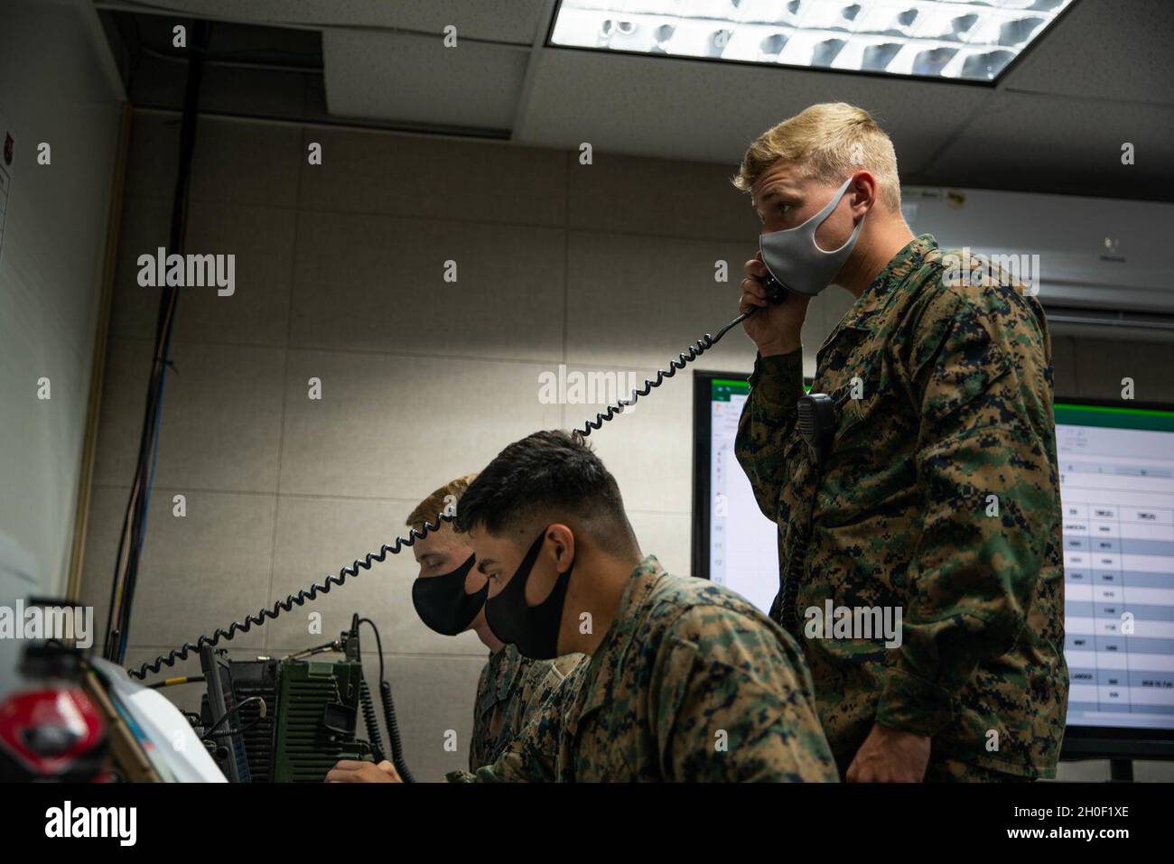 U.S. Marine Corps Cpl. Trygve Lund, a radio operator with Headquarters ...
