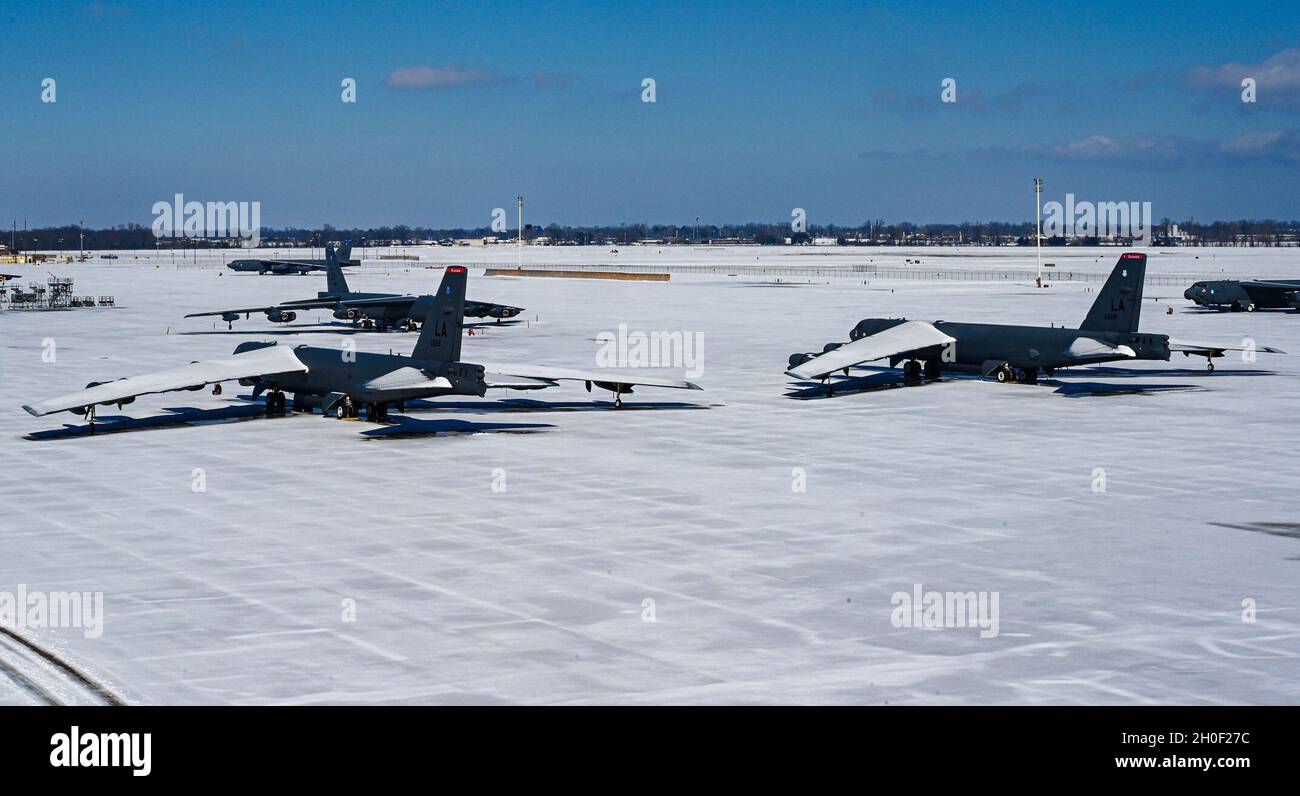 Snow covered B-52H Stratofortresses sit on the flightline at Barksdale ...