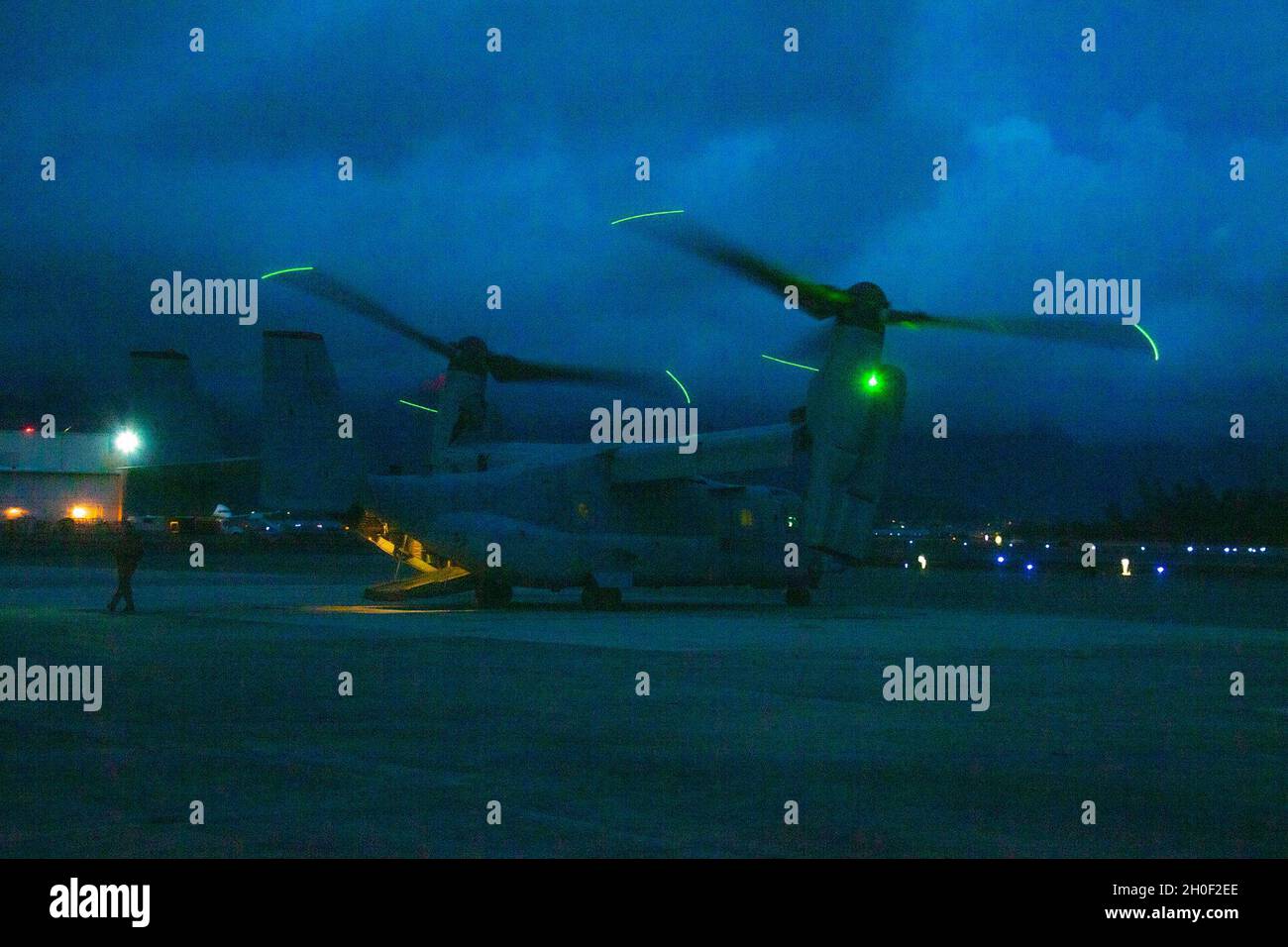 U.S. Marines with Marine Medium Tiltrotor Squadron 363 prepare an MV-22 ...