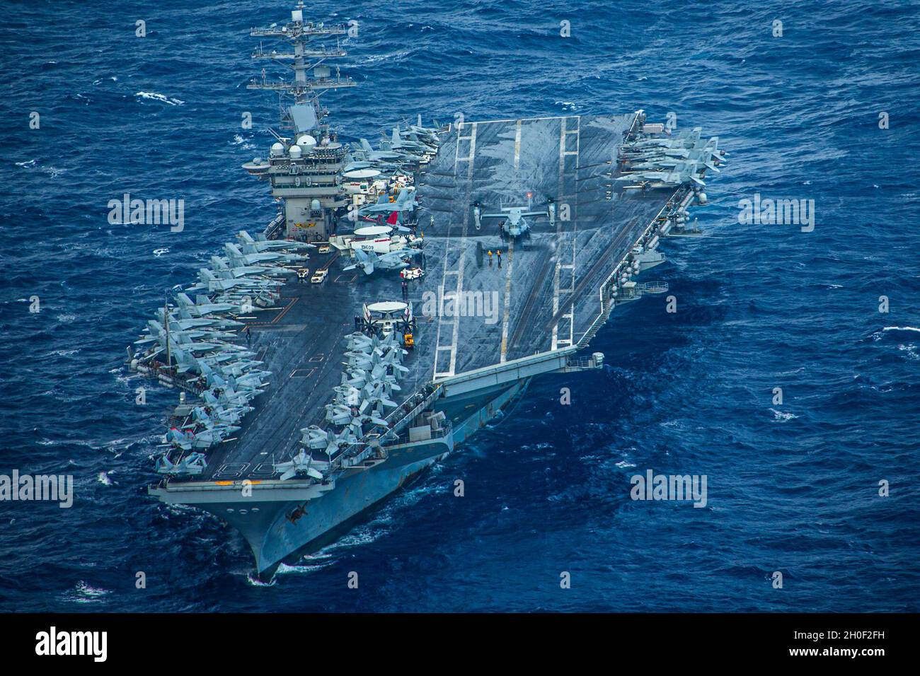 U.S. Marines with Marine Medium Tiltrotor Squadron 363 land an MV-22 ...