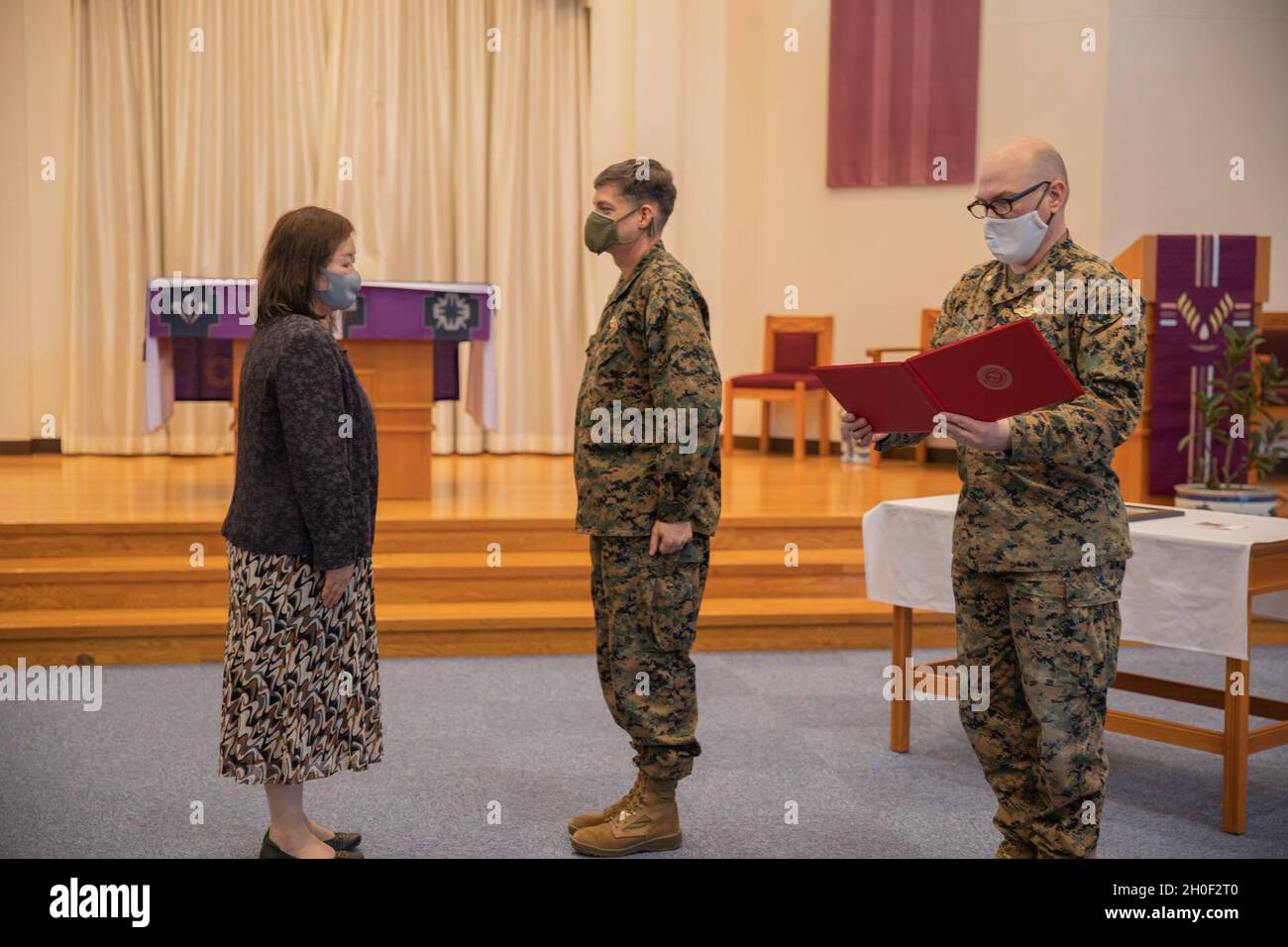 Noriko Yamada, left, an administrative specialist with the station ...
