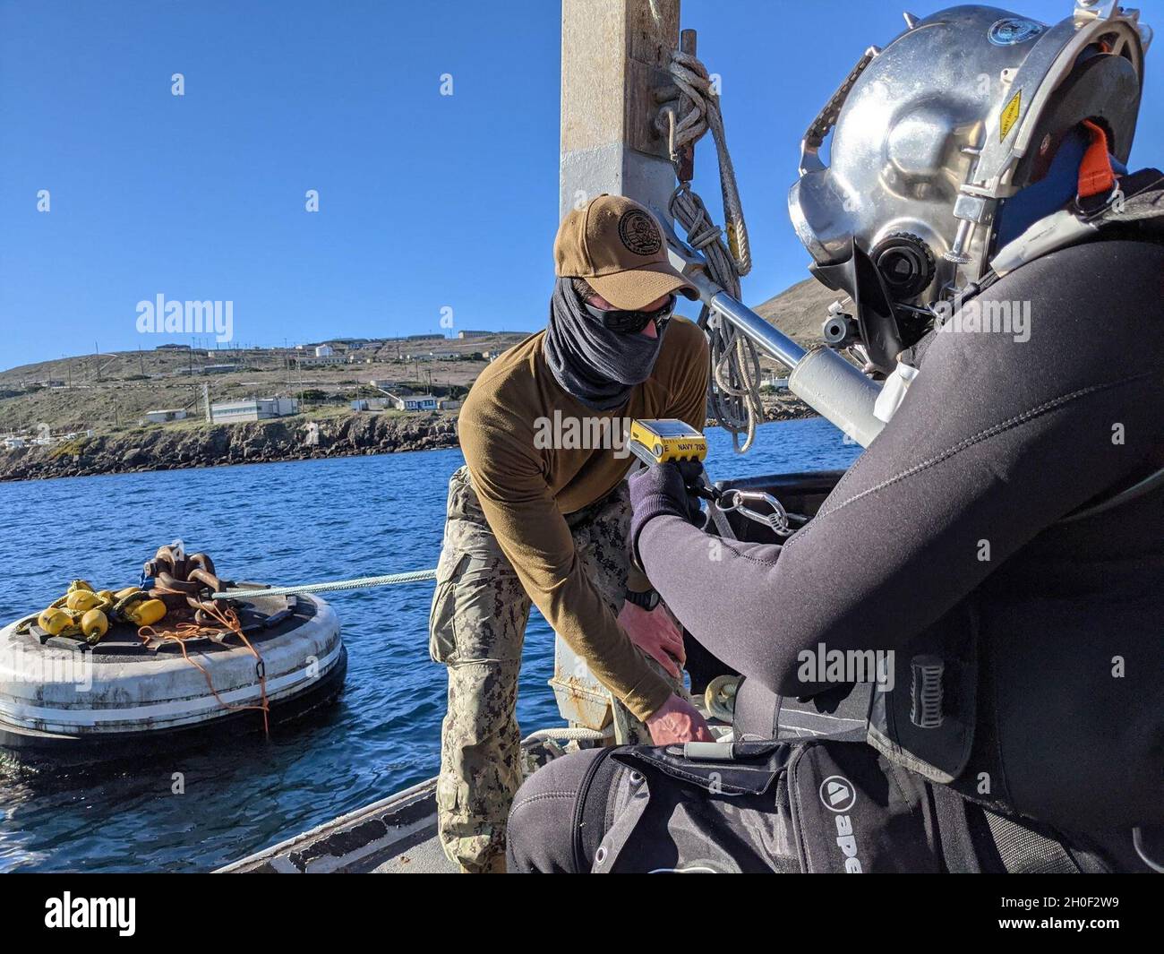 U.S. Navy Equipment Operator 3rd Class Connor Koltes, a Seabee Diver ...