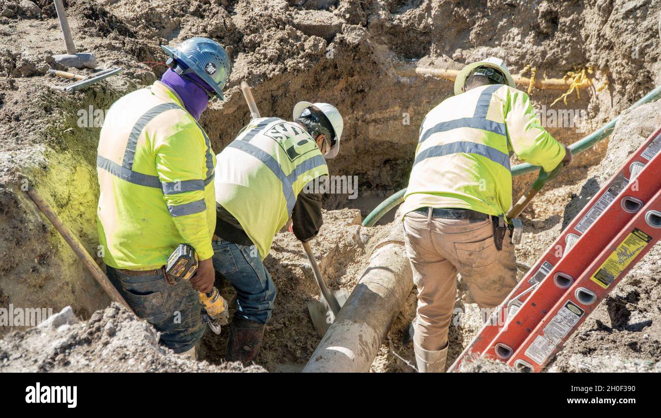 Water line operators at Fort Hood, Texas replaced a section of a main ...