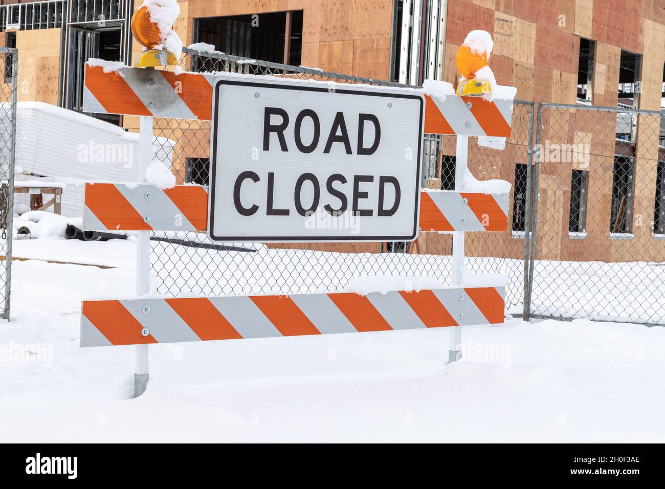 Road closed sign with new building construction in background Stock ...