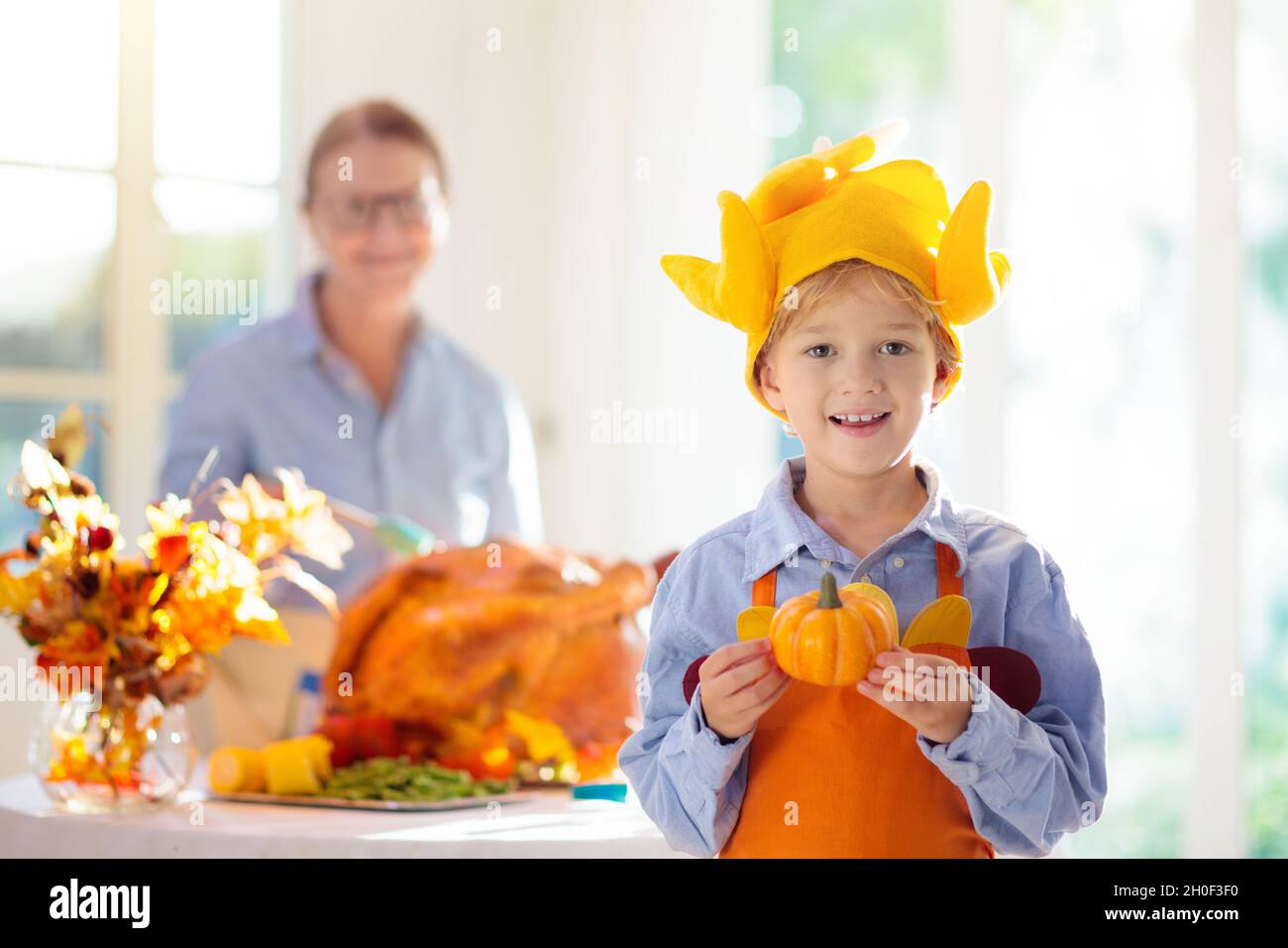 Turkey for Thanksgiving. Family cooking festive dinner. Grandmother and ...