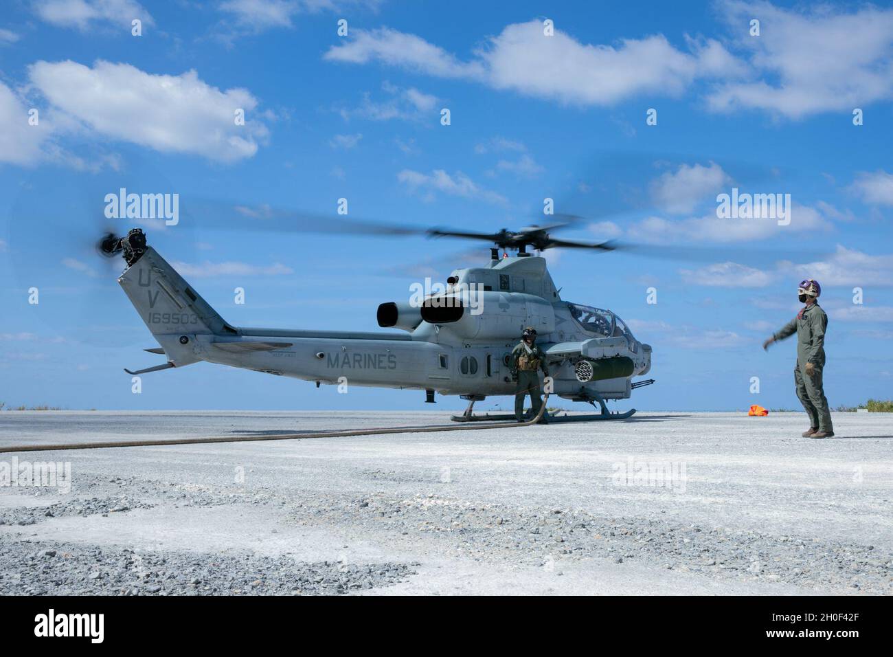 U.S. Marine Corps Cpl. Kenneth Munsinger, a bulk fuel specialist with ...