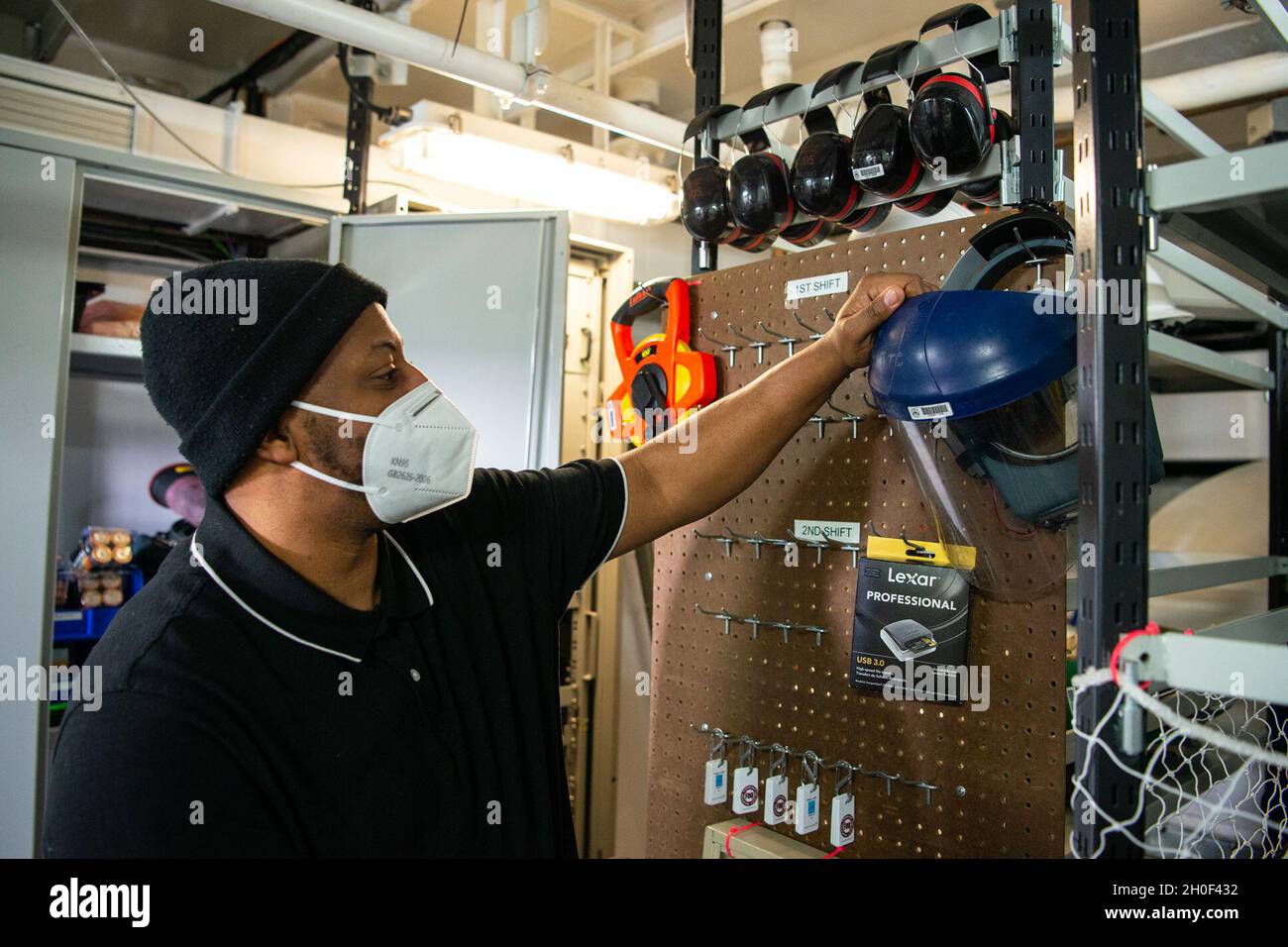 Troy Berry, logistics material handler, sets up the logistics tool room ...