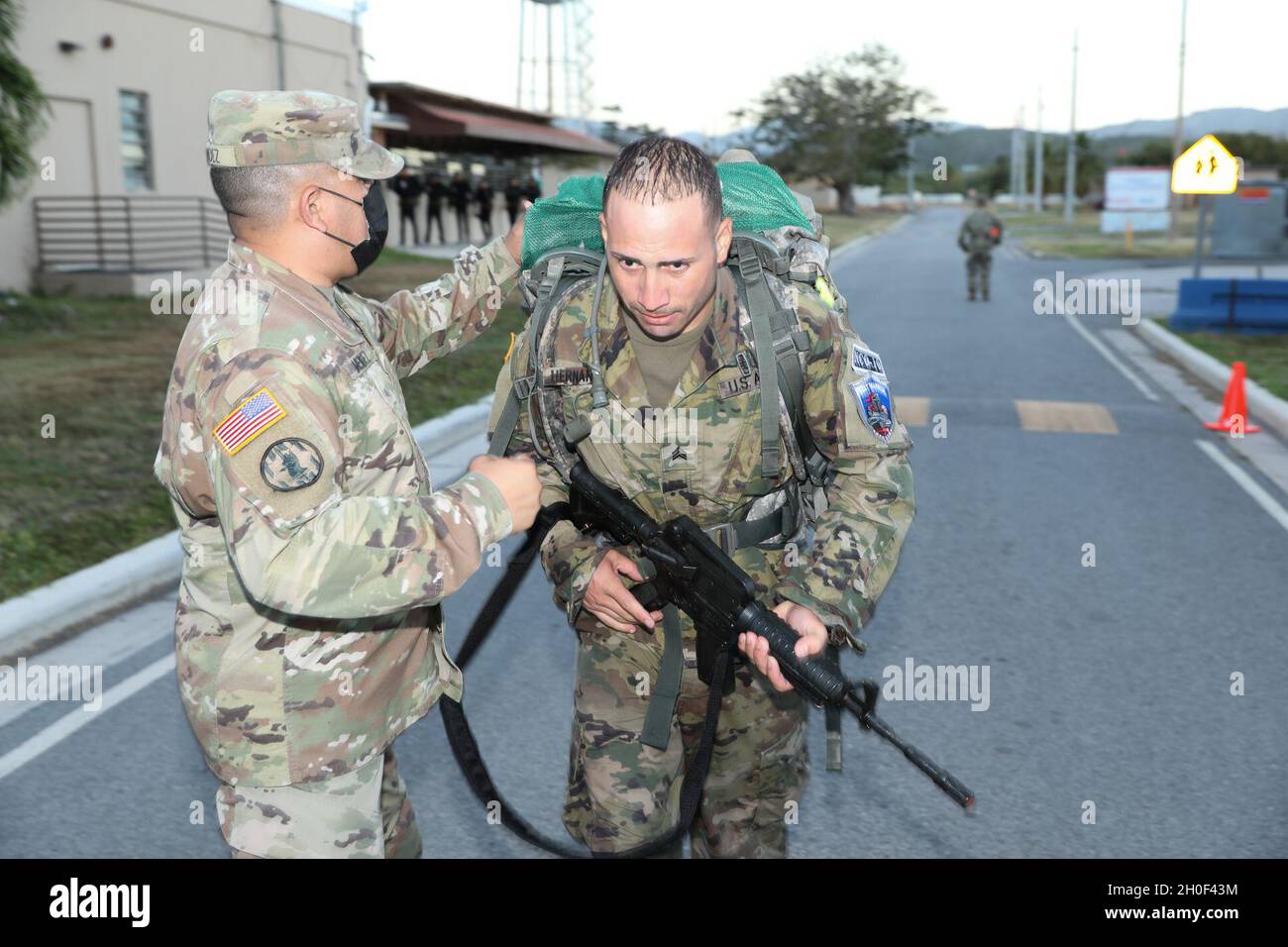 Command Sgt. Maj. Juvencio Méndez congratulates Sgt. Armando Luis ...