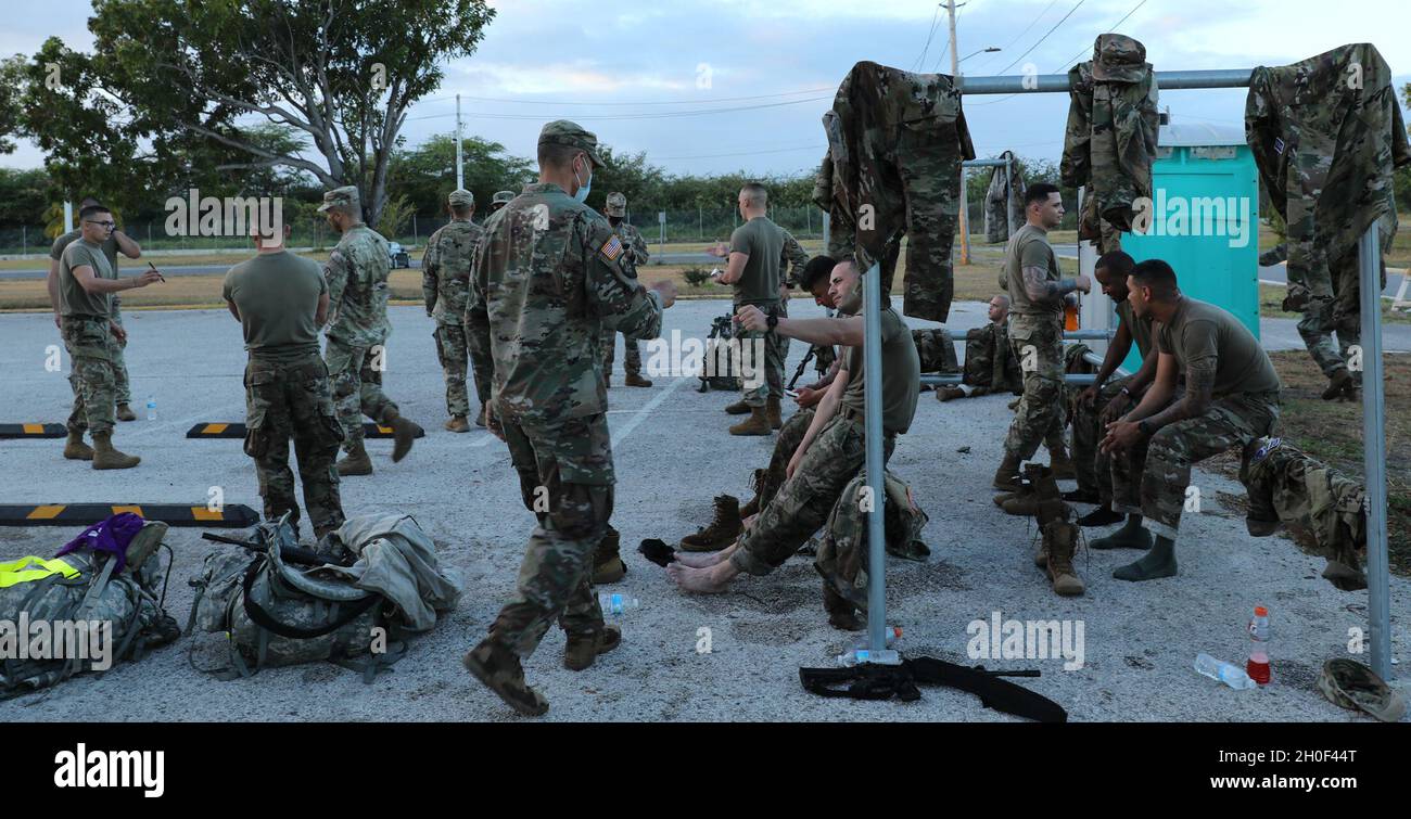 The Puerto Rico Army National Guard soldiers celebrate and rest after ...