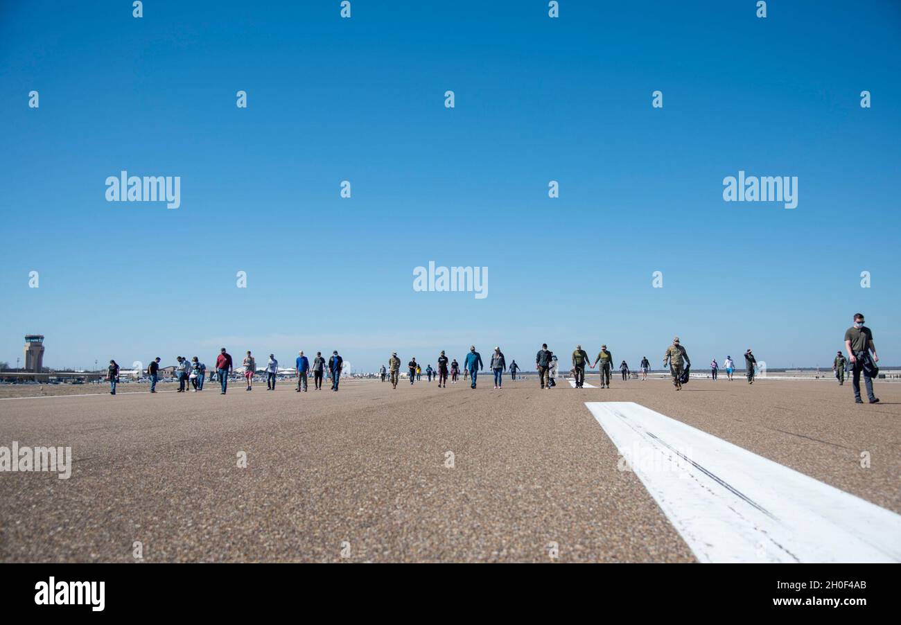 Members of the 47th Flying Training Wing, conduct a foreign object ...