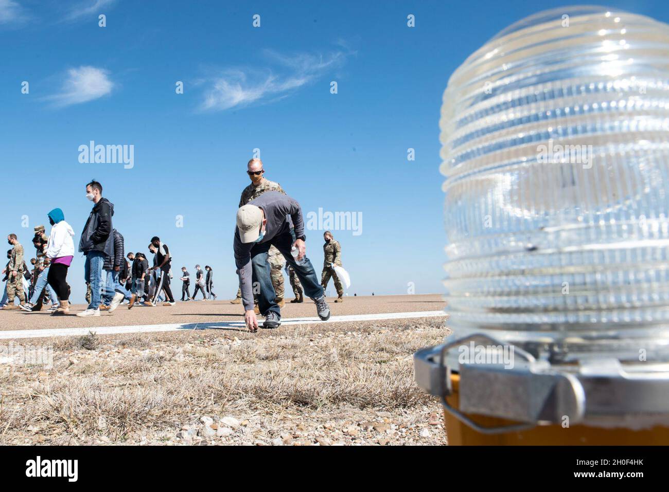 Members of the 47th Flying Training Wing, conduct a foreign object ...