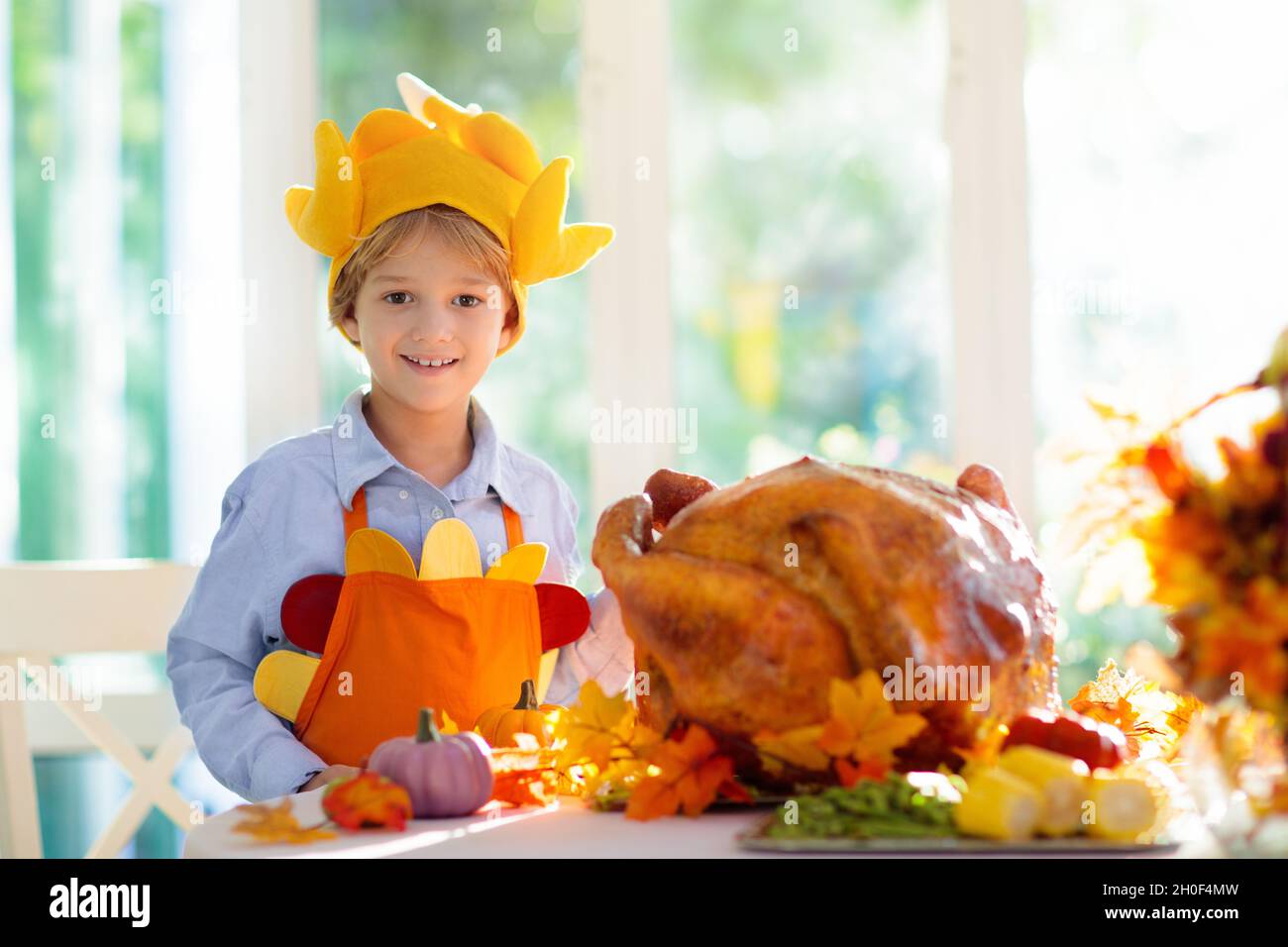 Turkey for Thanksgiving. Family cooking festive dinner. Grandmother and ...