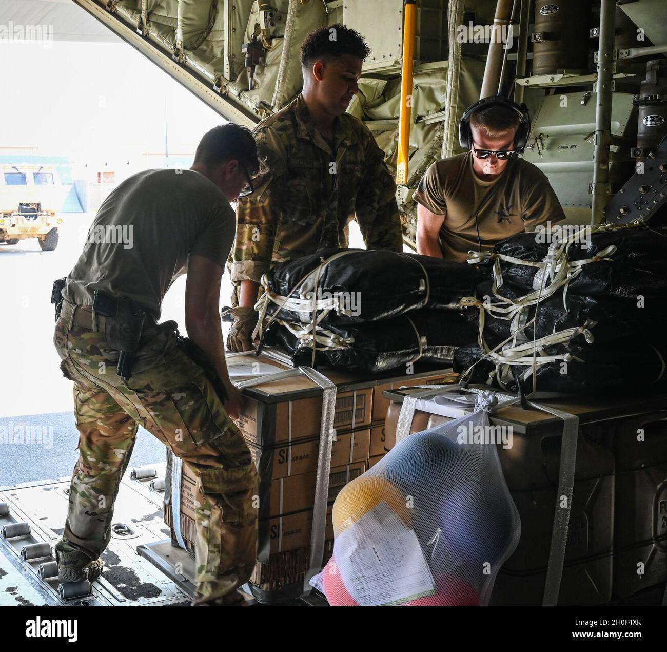 U.S. Air Force members assigned to the 75th Expeditionary Airlift ...