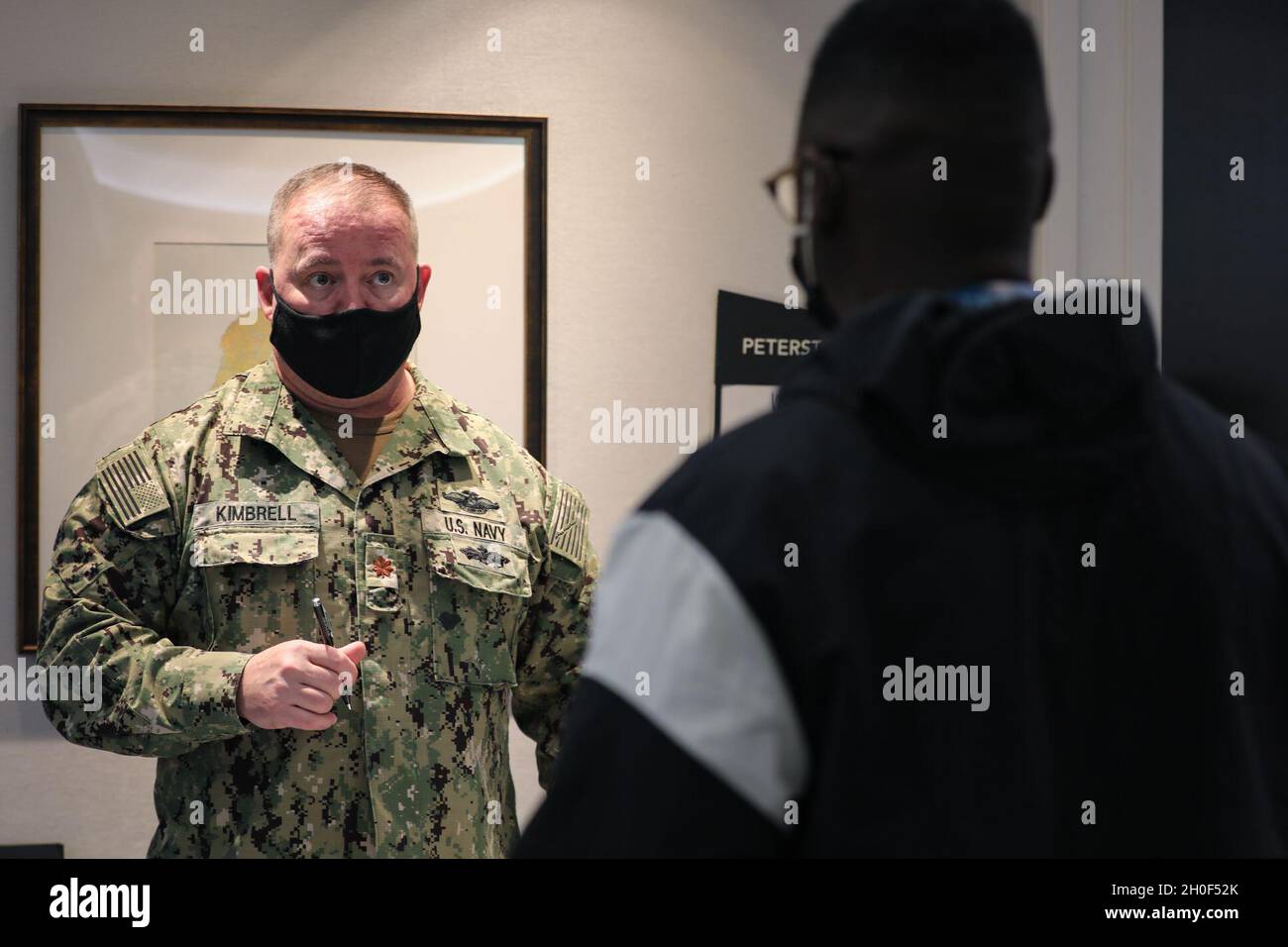 U.S. Navy Lt. Cmdr. Michael Kimbrell, a surgeon general representative ...